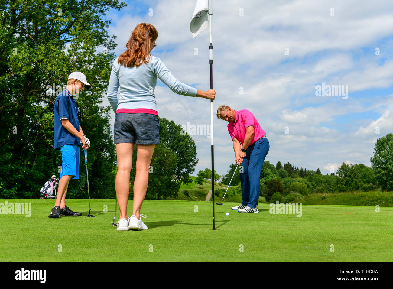 Boy playing golf hi-res stock photography and images - Alamy