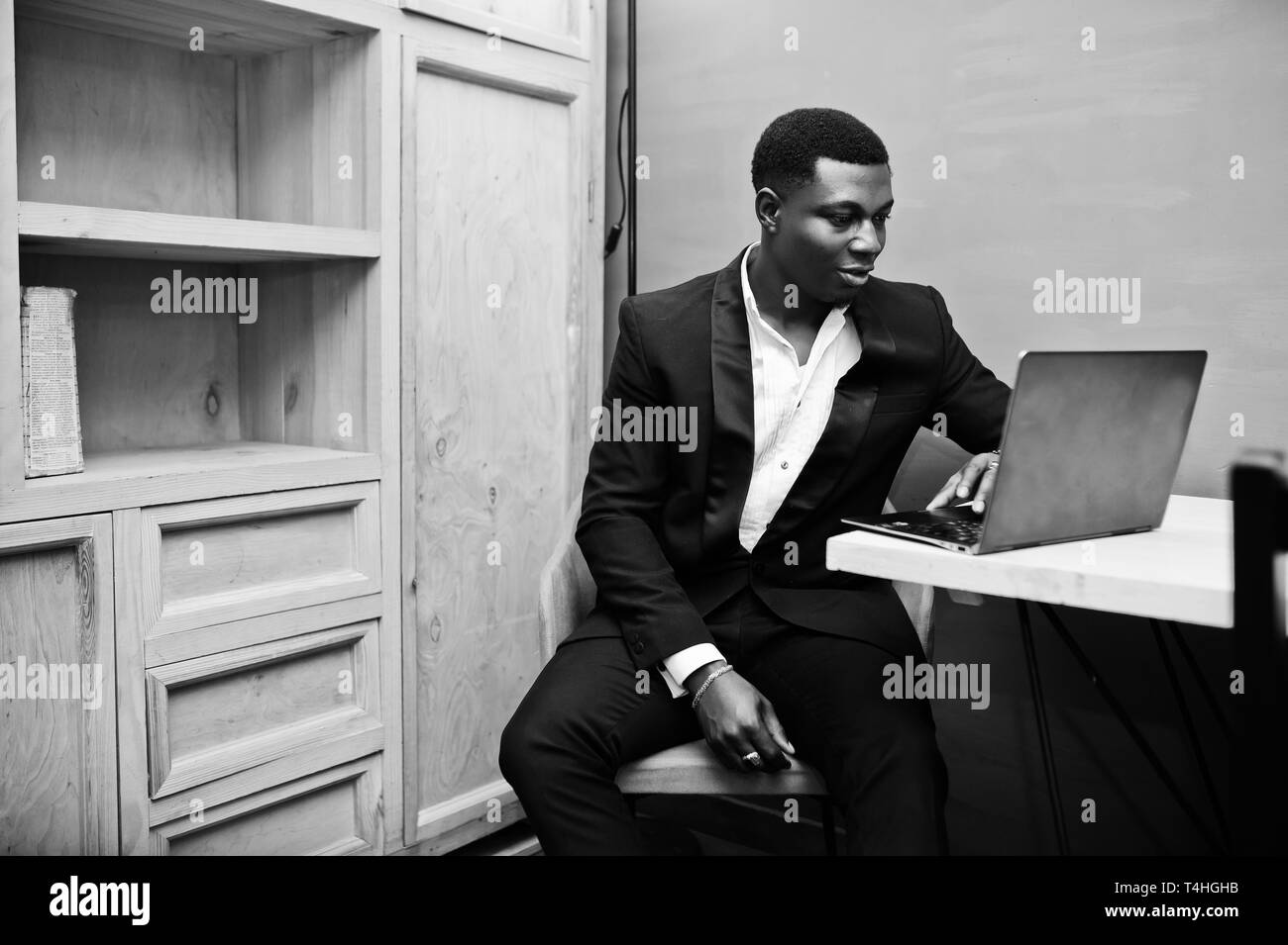 Confident handsome man typing Black and White Stock Photos & Images - Alamy