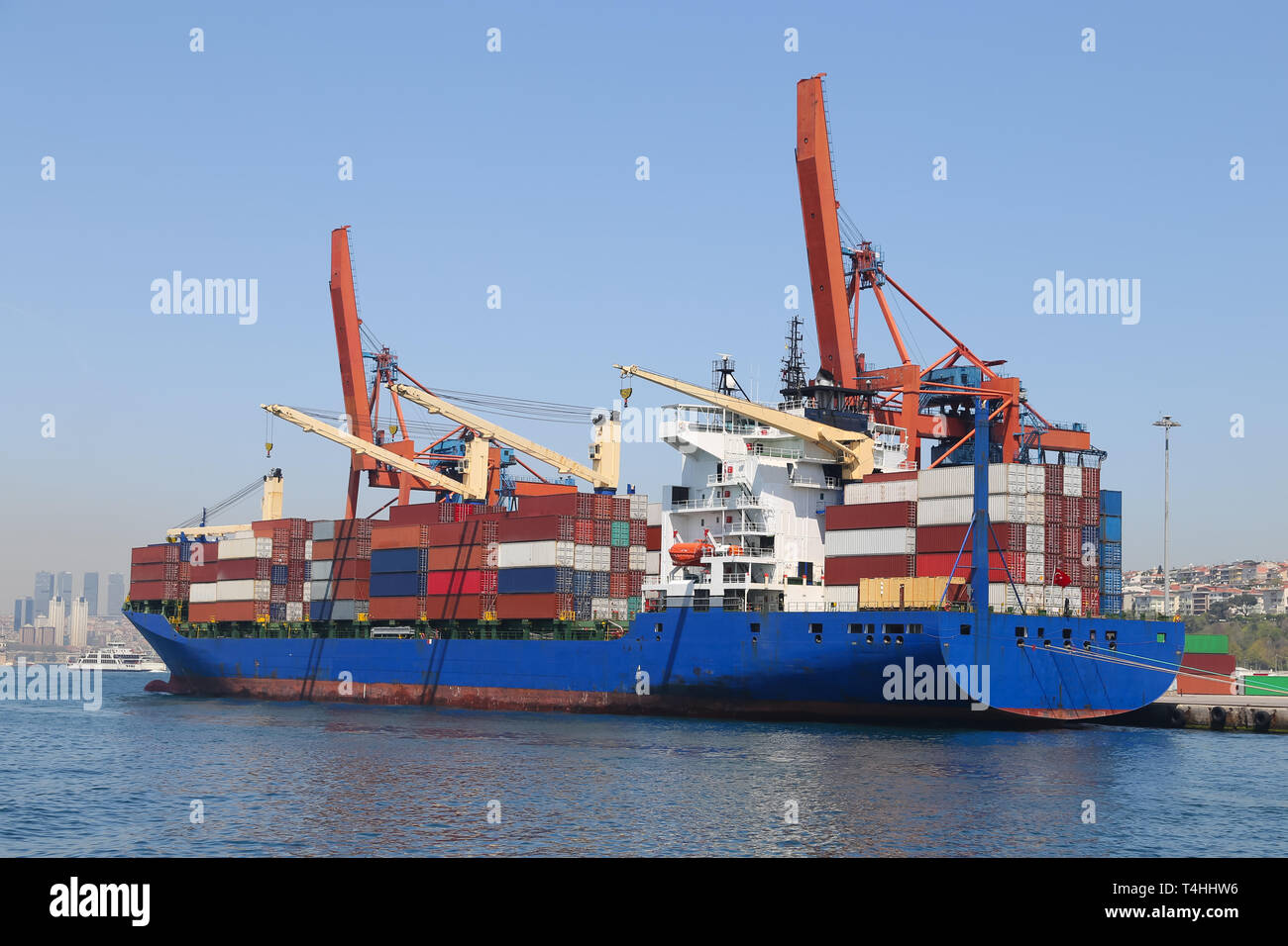 Container Ship is loading in a port Stock Photo - Alamy