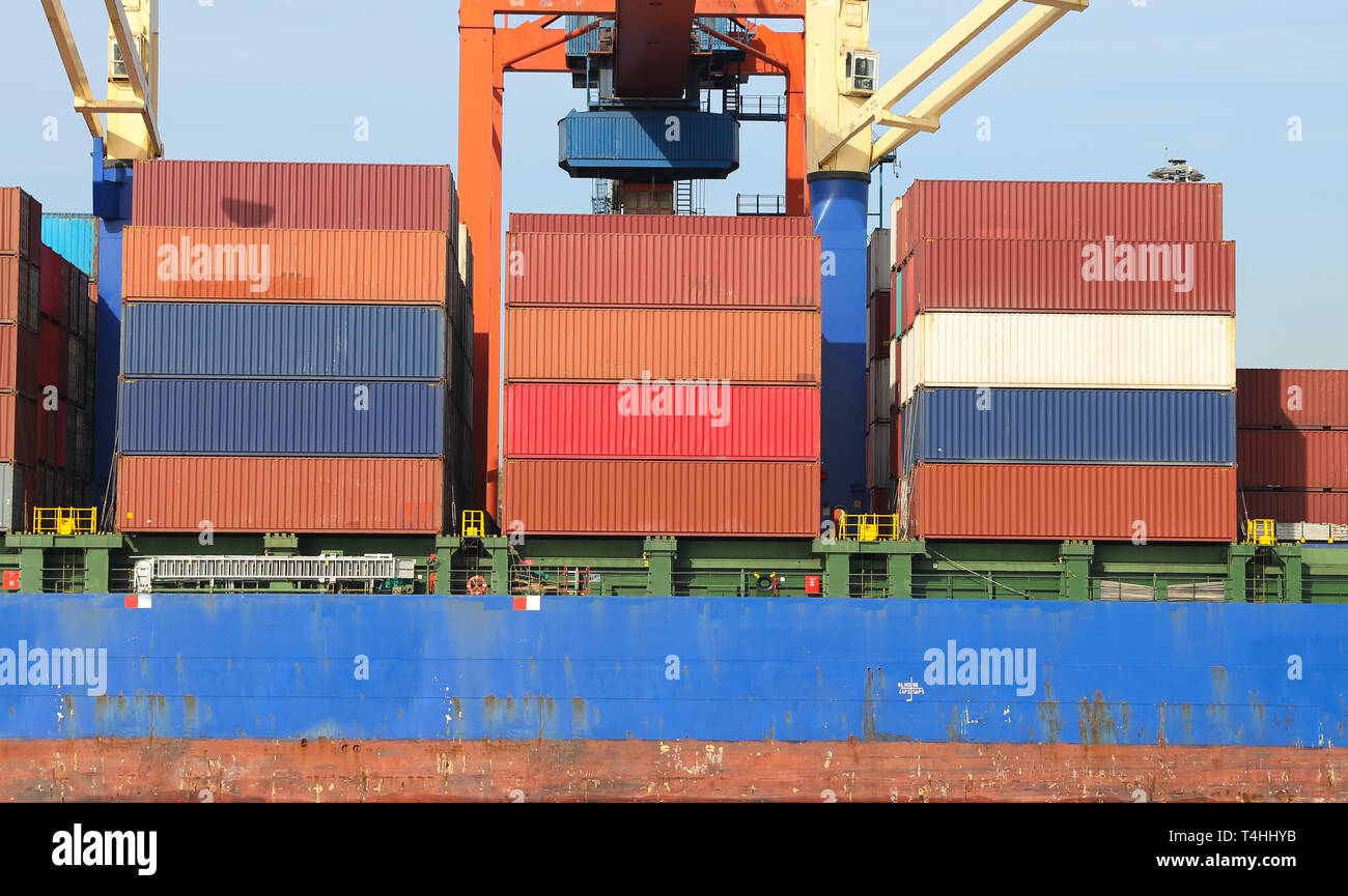 Container Ship is loading in a port Stock Photo - Alamy