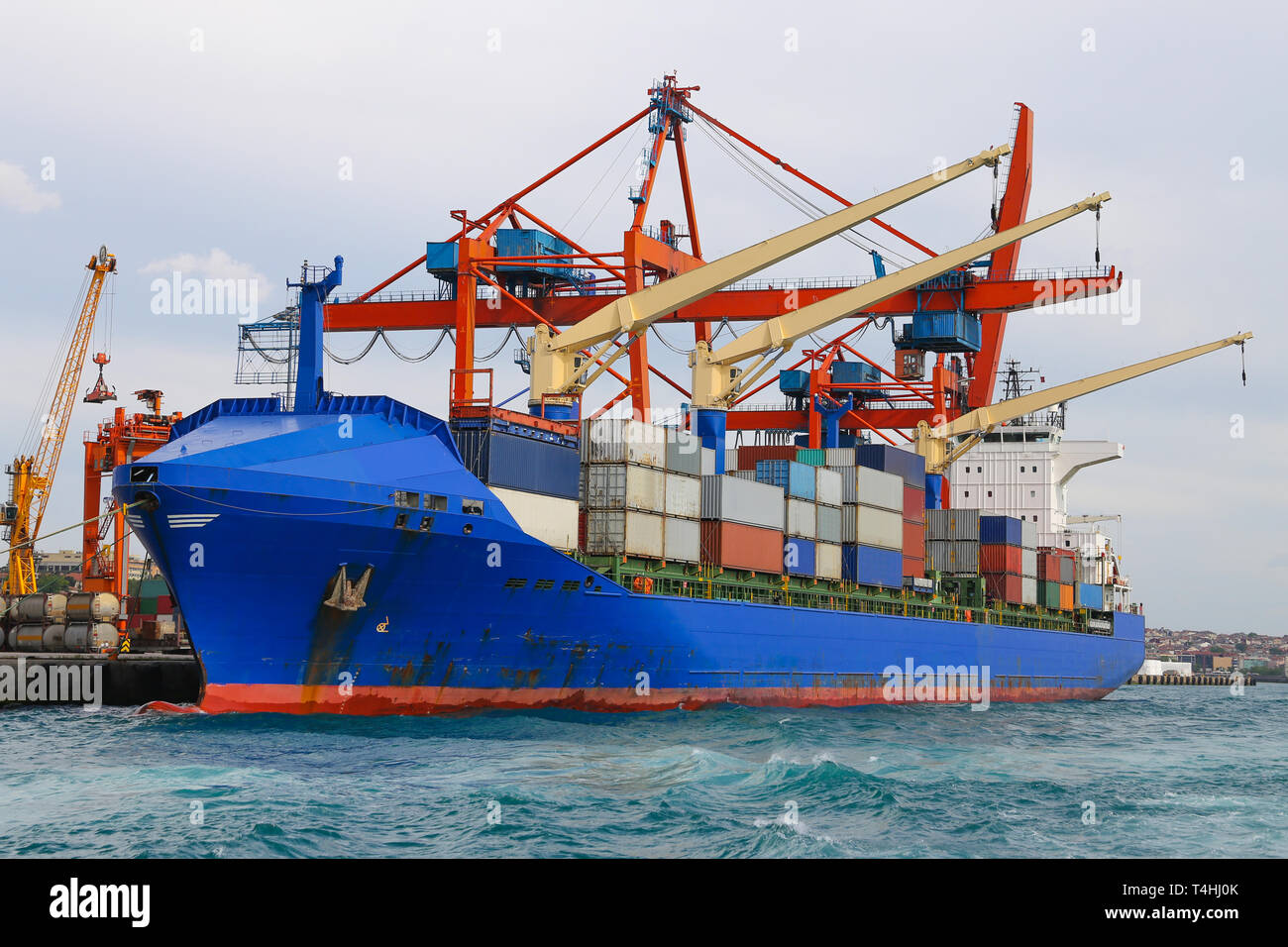 Container Ship is loading in a port Stock Photo - Alamy