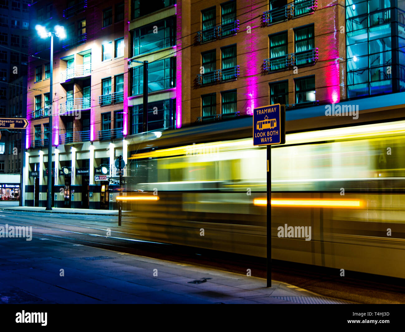 Night time manchester tram hi-res stock photography and images - Alamy