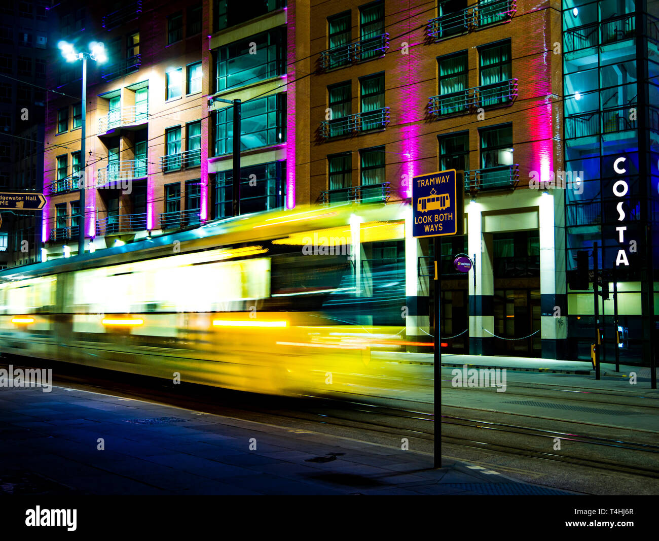 Manchester tram yellow hi-res stock photography and images - Alamy