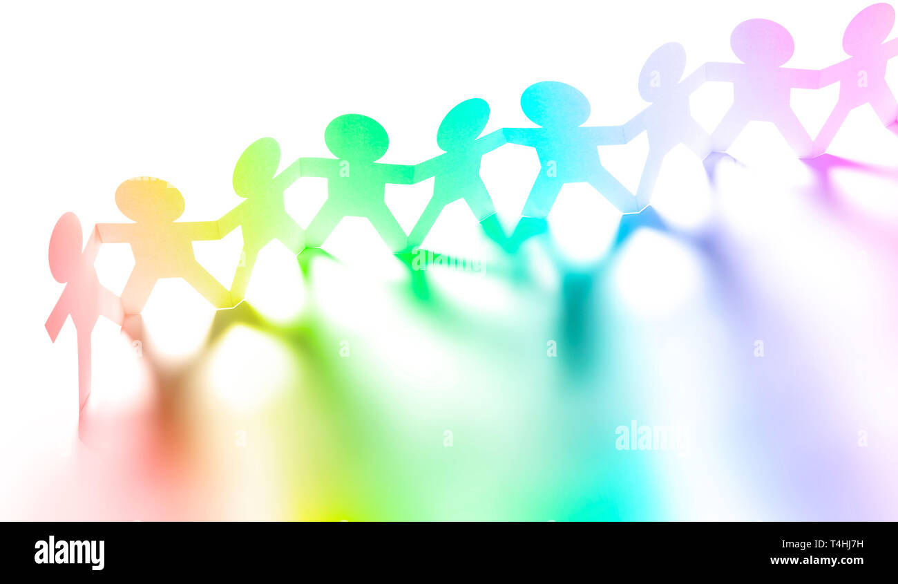 Colorful paper chain people holding hands Stock Photo - Alamy