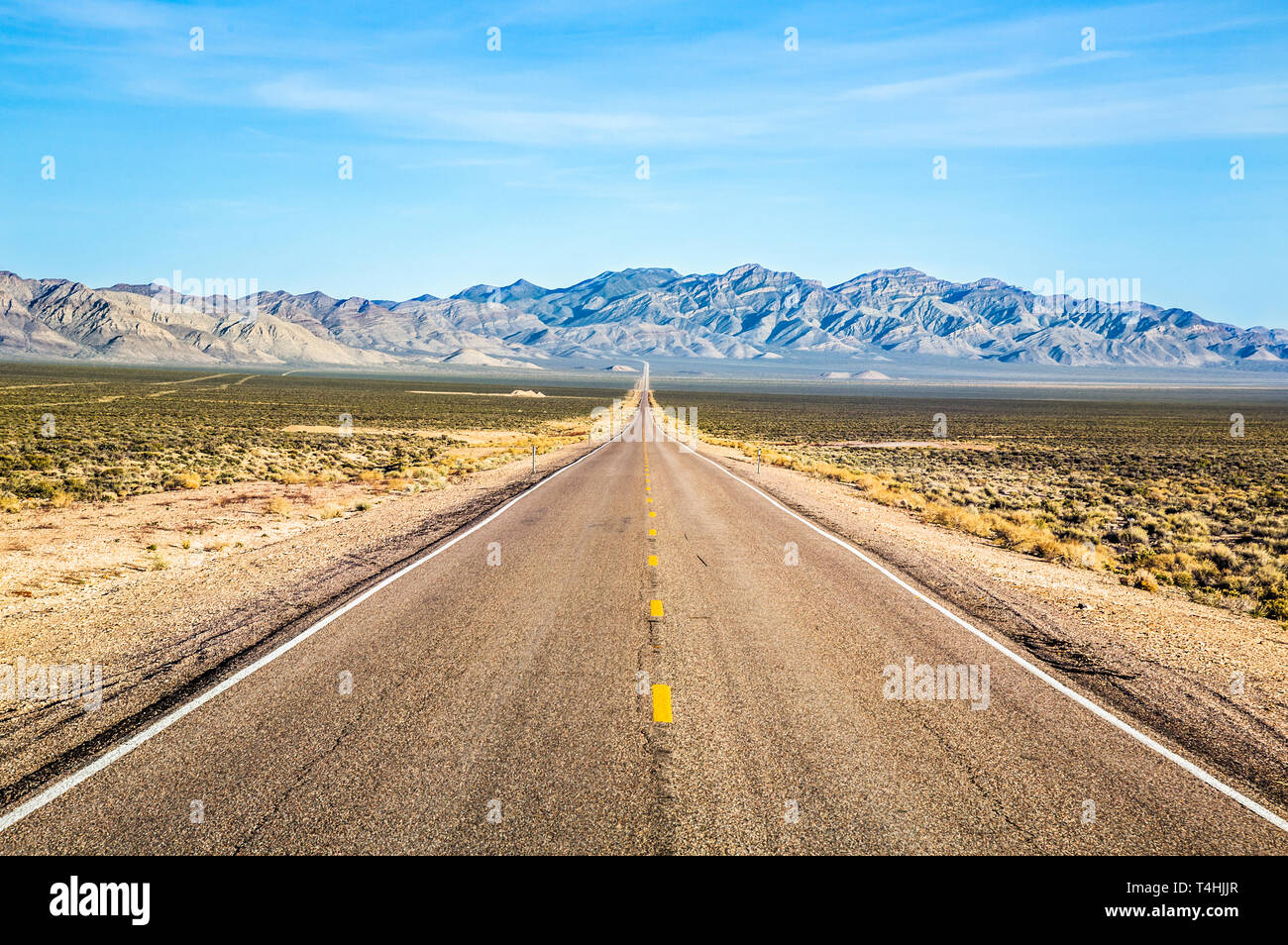 Wide open road through Nevada Desert near Area 51. The Extraterrestrial ...