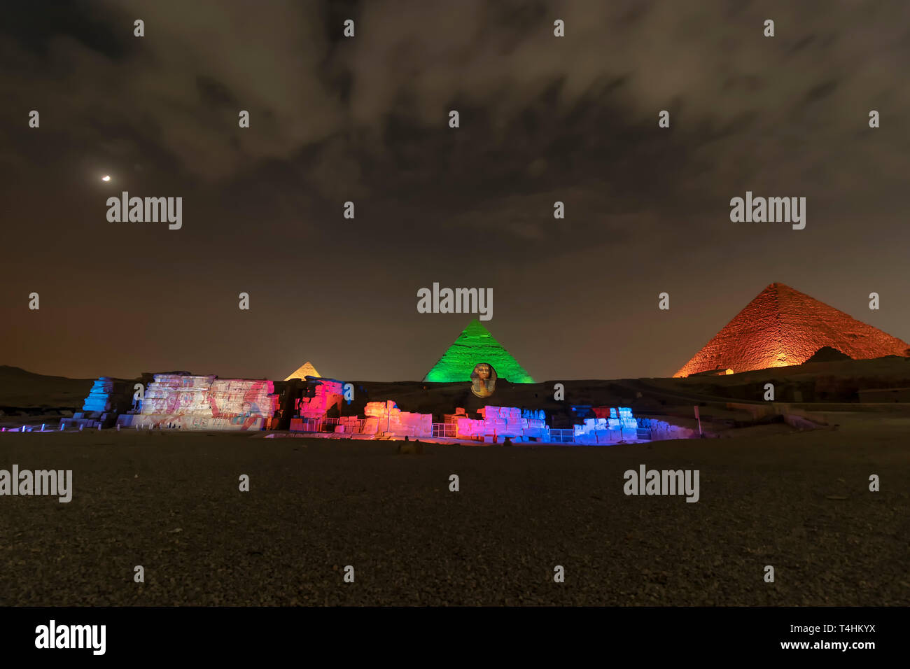Giza pyramids and Sphinx light up at night Stock Photo - Alamy