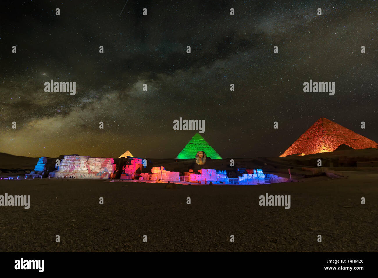 Giza pyramids and Sphinx light up at night Stock Photo - Alamy