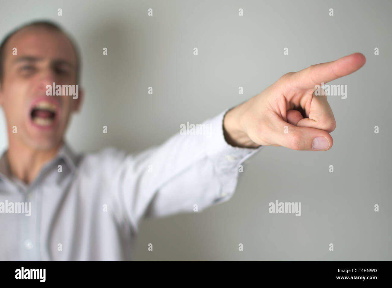 Angry Man Pointing Away