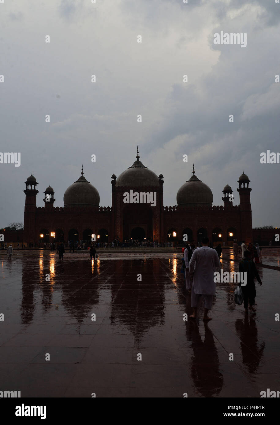 Thousands of Pakistani People arrive to attend the Maghrib prayer ...