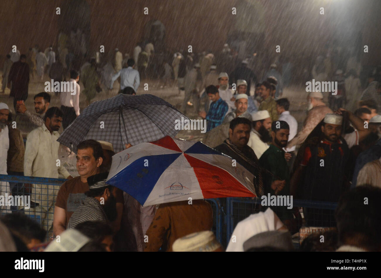 Thousands of Pakistani People arrive to attend the Maghrib prayer ...