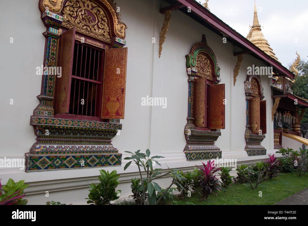 Chiang Mai Thailand, view of decorated windows and shutters along the ...