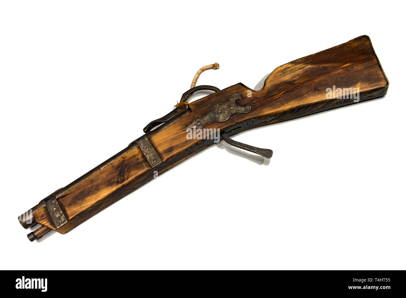 An old historical riffle witch match cord. Poachers gun, beginning of ...