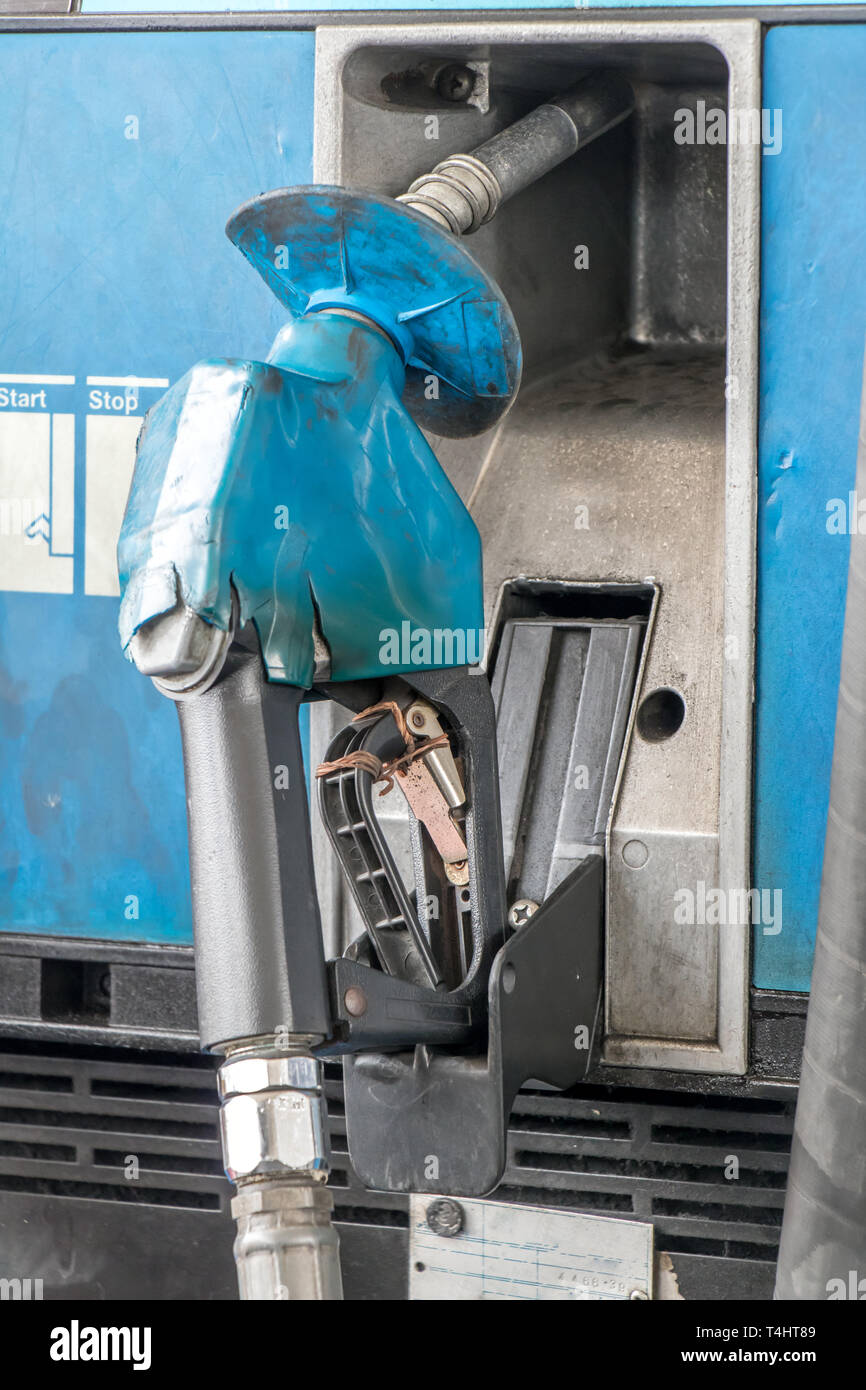 The gas station. The detailed view of the handle of the pistol from the ...