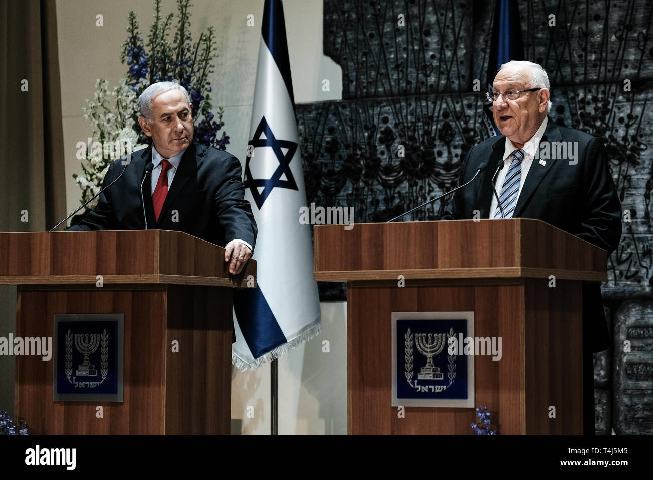 Jerusalem, Israel. 17th April, 2019. Israeli President REUVEN RIVLIN (R) makes an address after ...
