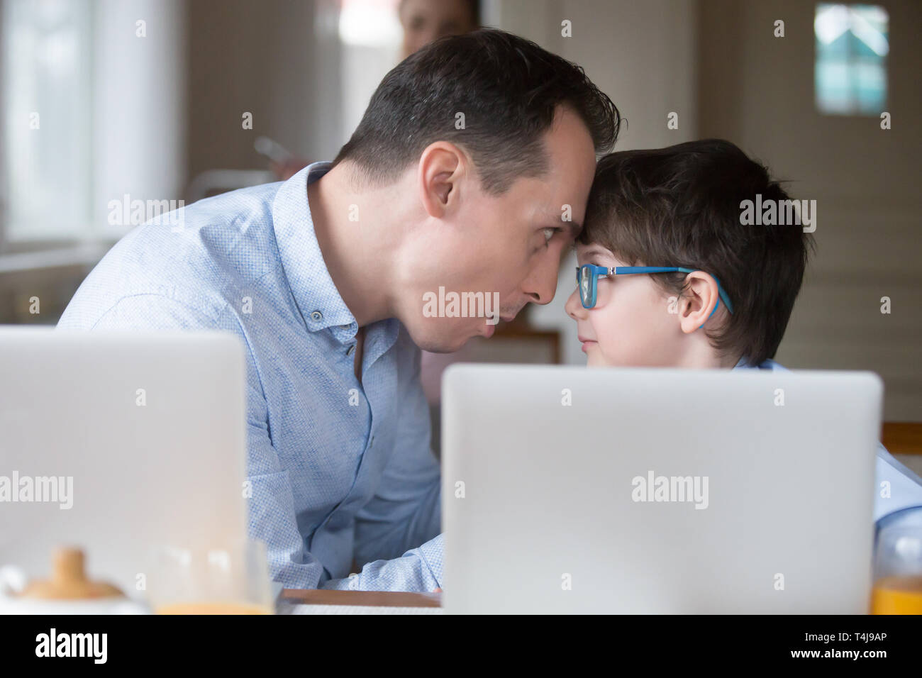 Dad interacting with son hi-res stock photography and images - Alamy