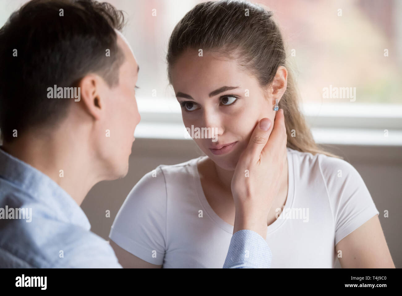 Husband consoling sad wife hi-res stock photography and images - Alamy