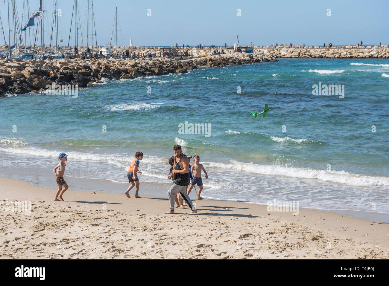 Kids playing on the beach hi-res stock photography and images - Alamy