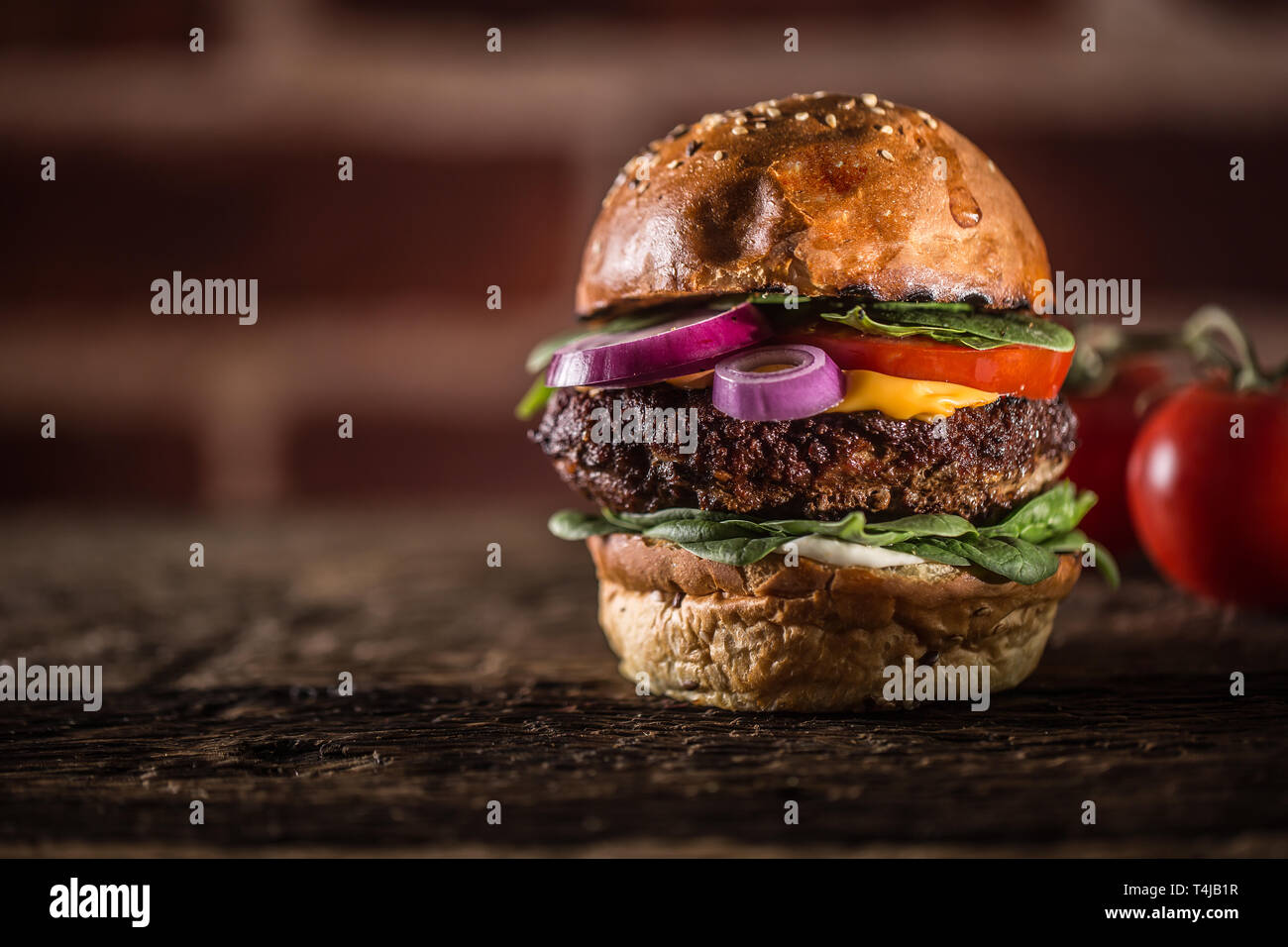 Beef cheese hamburger lettuce tomato hi-res stock photography and ...