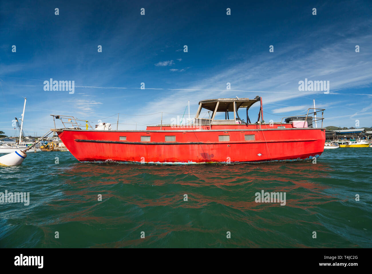 Boats in a Bay. Beautiful Blue Sky Background Stock Photo - Alamy