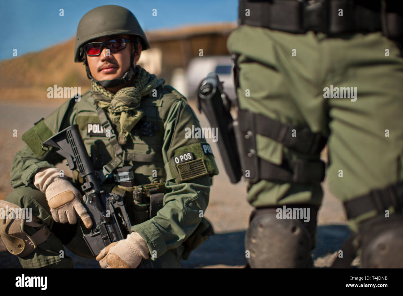 Male police officer at a training facility Stock Photo - Alamy