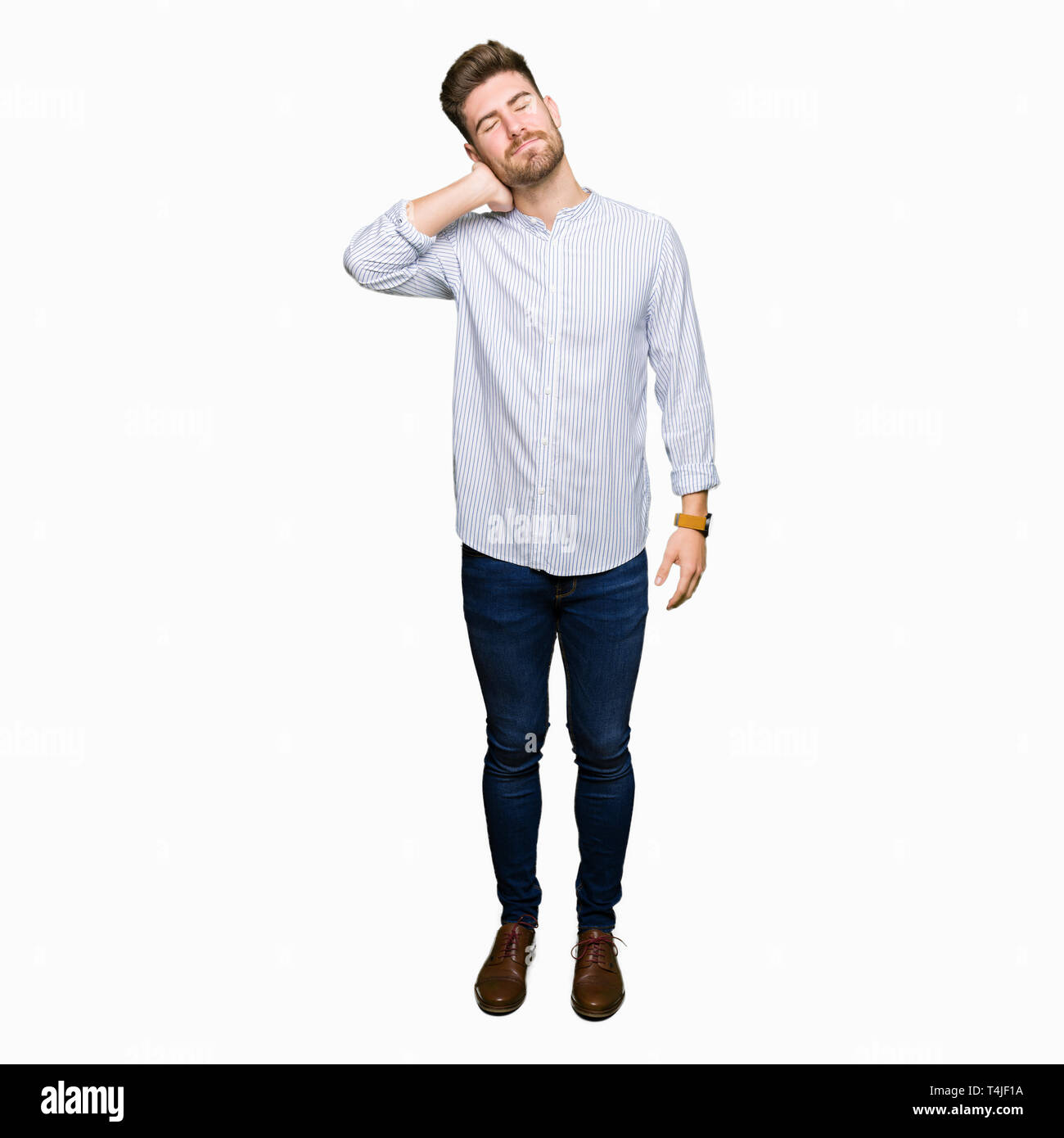 Young handsome man Suffering of neck ache injury, touching neck with ...