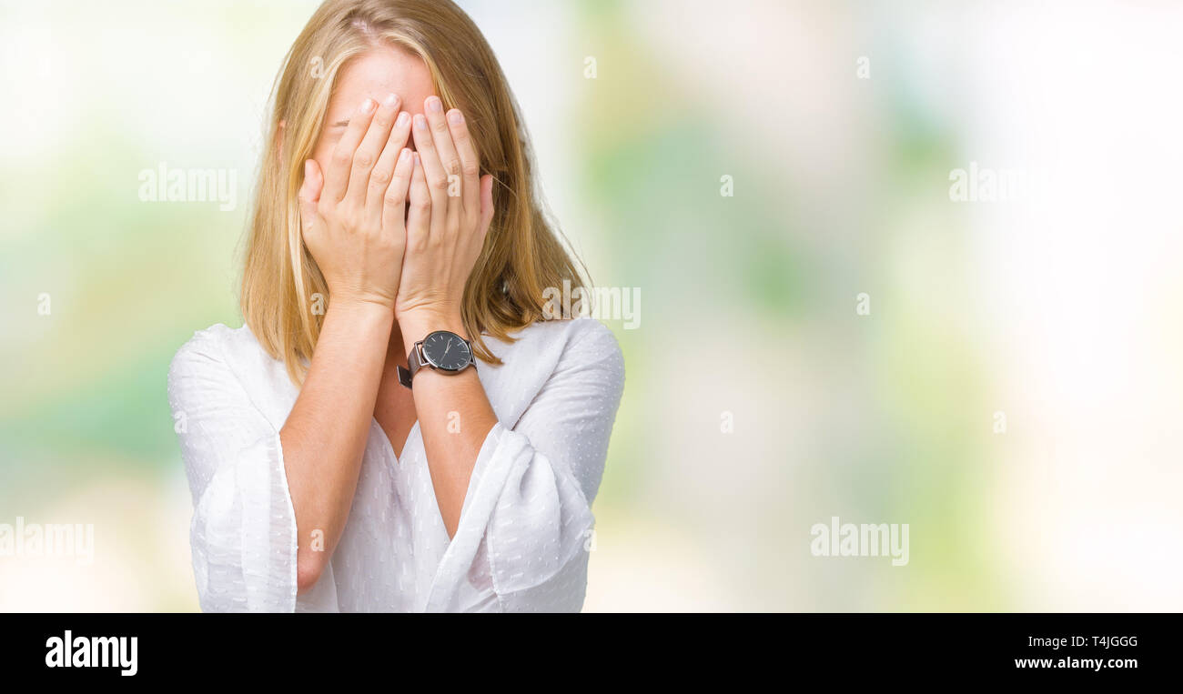 Beautiful young elegant woman over isolated background with sad ...