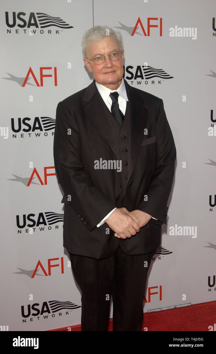 LOS ANGELES, CA. June 10, 2004: Film critic ROGER EBERT & wife at the ...