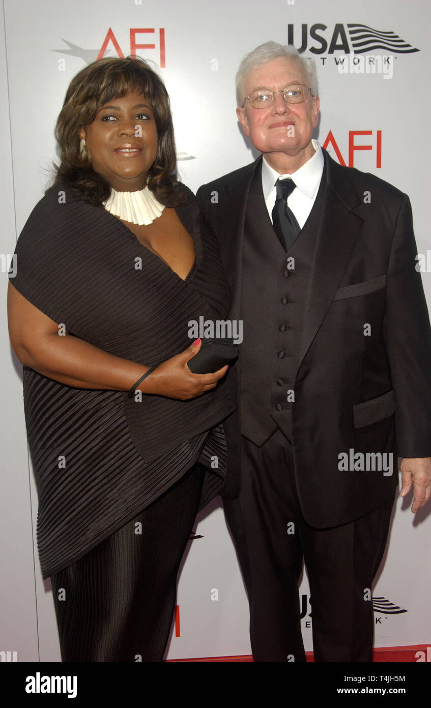 LOS ANGELES, CA. June 10, 2004: Film critic ROGER EBERT & wife at the ...