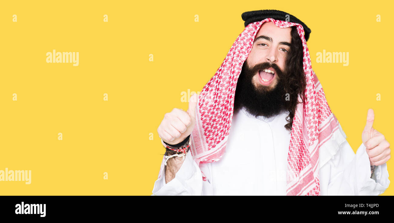 Arabian business man with long hair wearing traditional keffiyeh scarf ...