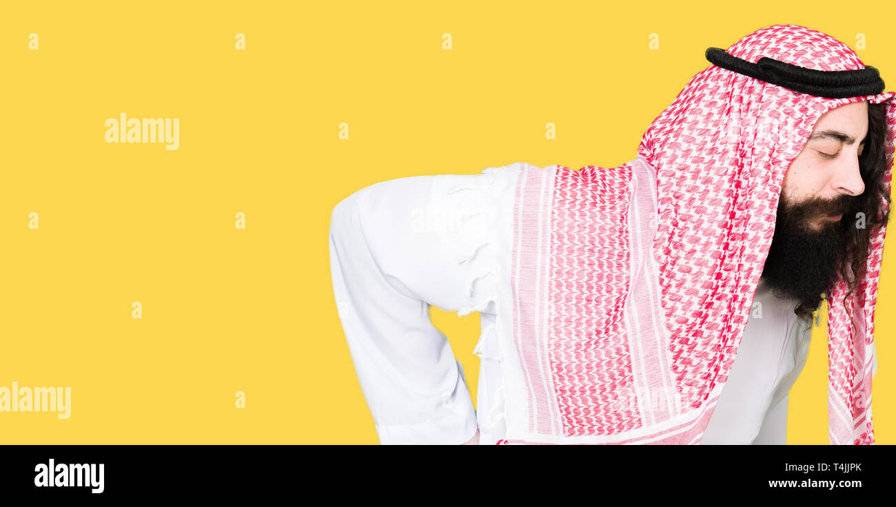 Arabian business man with long hair wearing traditional keffiyeh scarf ...