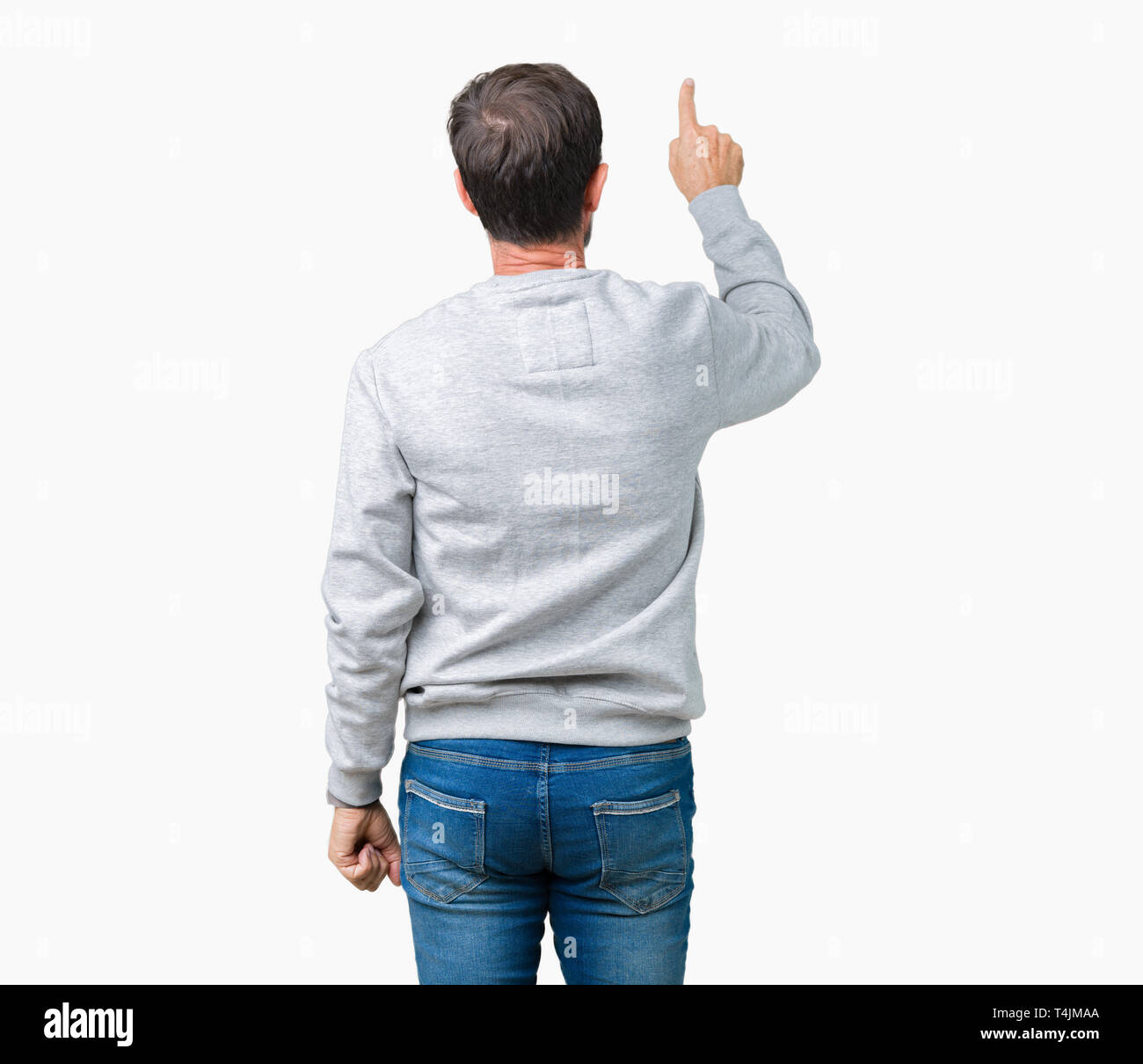 Handsome middle age senior man wearing a sweatshirt over isolated ...