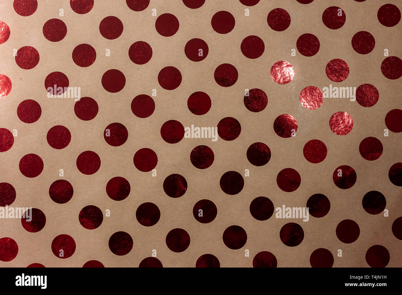 craft brown paper with red dots background Stock Photo - Alamy