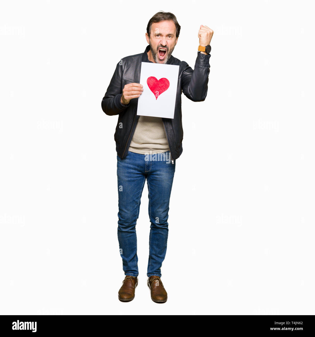 Handsome middle age man holding paper with red heart annoyed and ...