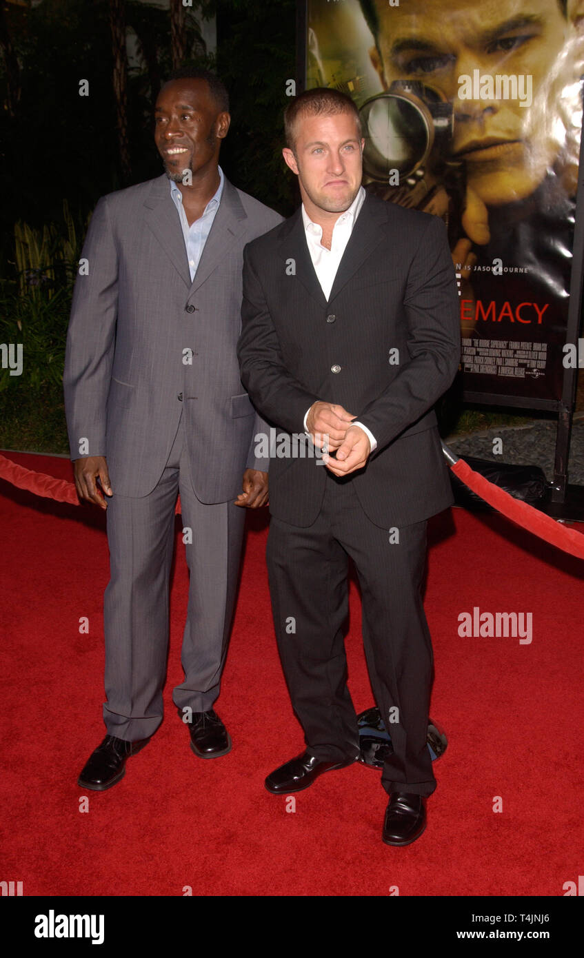 LOS ANGELES, CA. July 15, 2004: Actors SCOTT CAAN (right) & DON CHEADLE ...