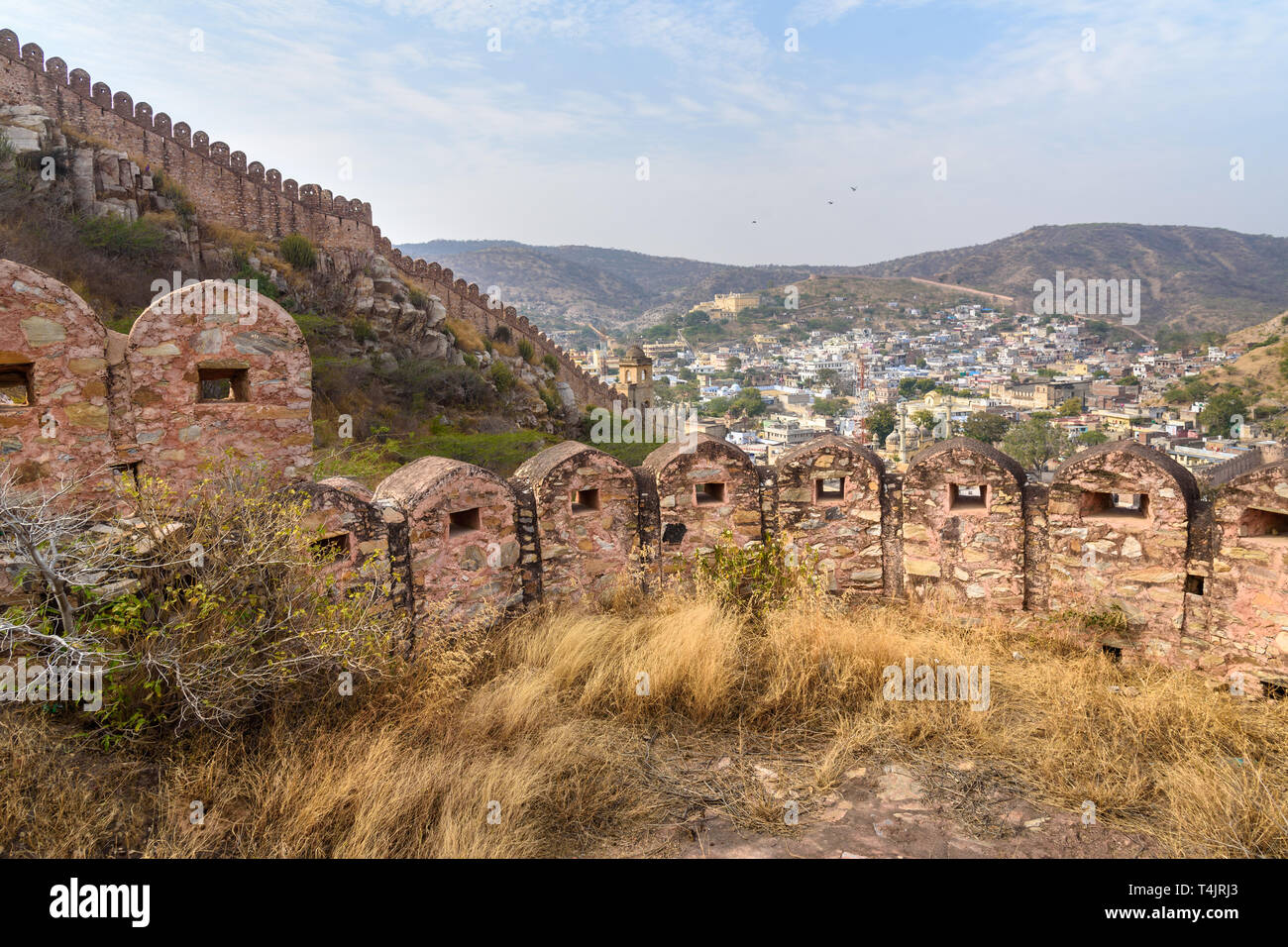 Ancient long wall with towers around Amber Fort and view of Amber ...
