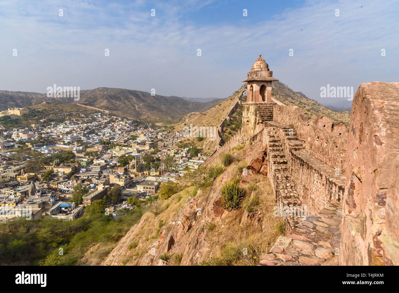 Ancient long wall with towers around Amber Fort and view of Amber ...