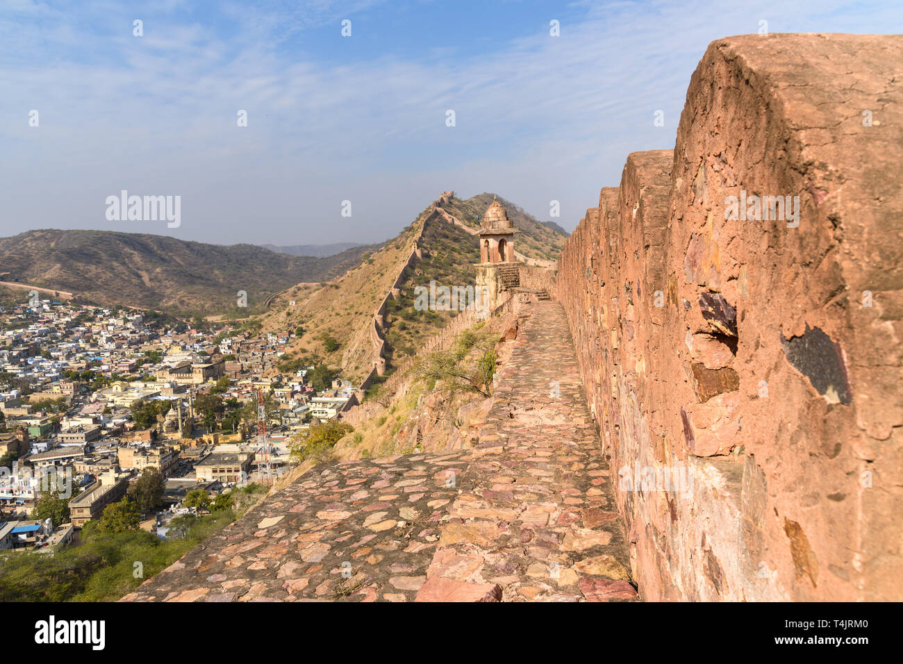 Ancient long wall with towers around Amber Fort and view of Amber ...