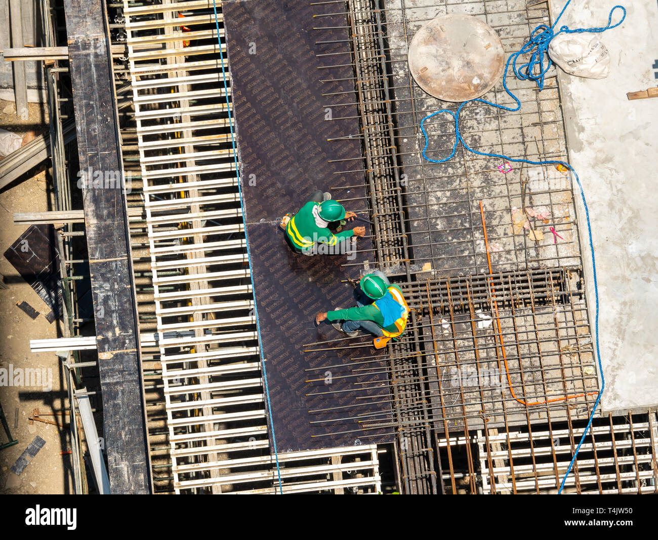 Construction workers working in the building, Philippines Stock Photo ...