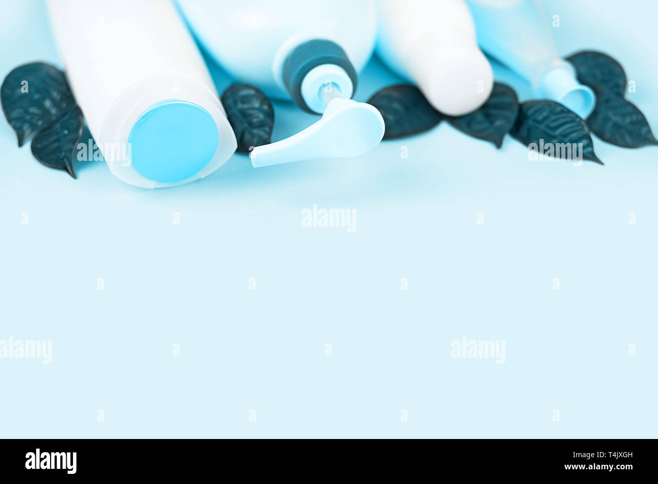 A set of cosmetics for the body tinted image blue. Hair care Stock ...