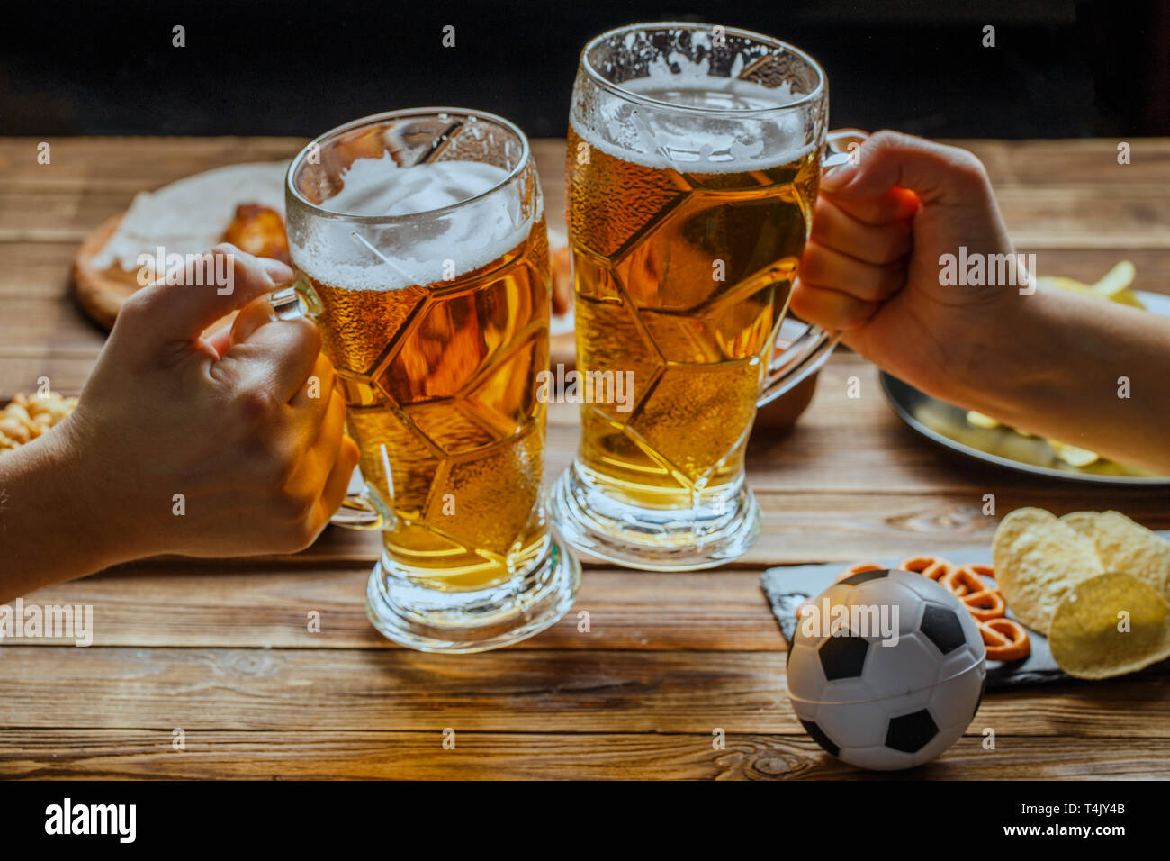 Appetizers and beer on the table for watch the football match Stock ...