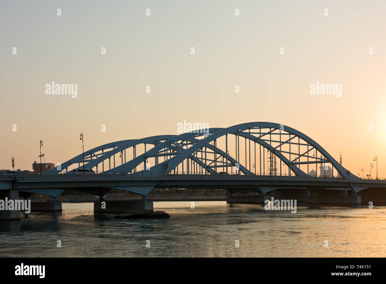 Maqta Bridge in Abu Dhabi, United Arab Emirates. Sunset view with water ...