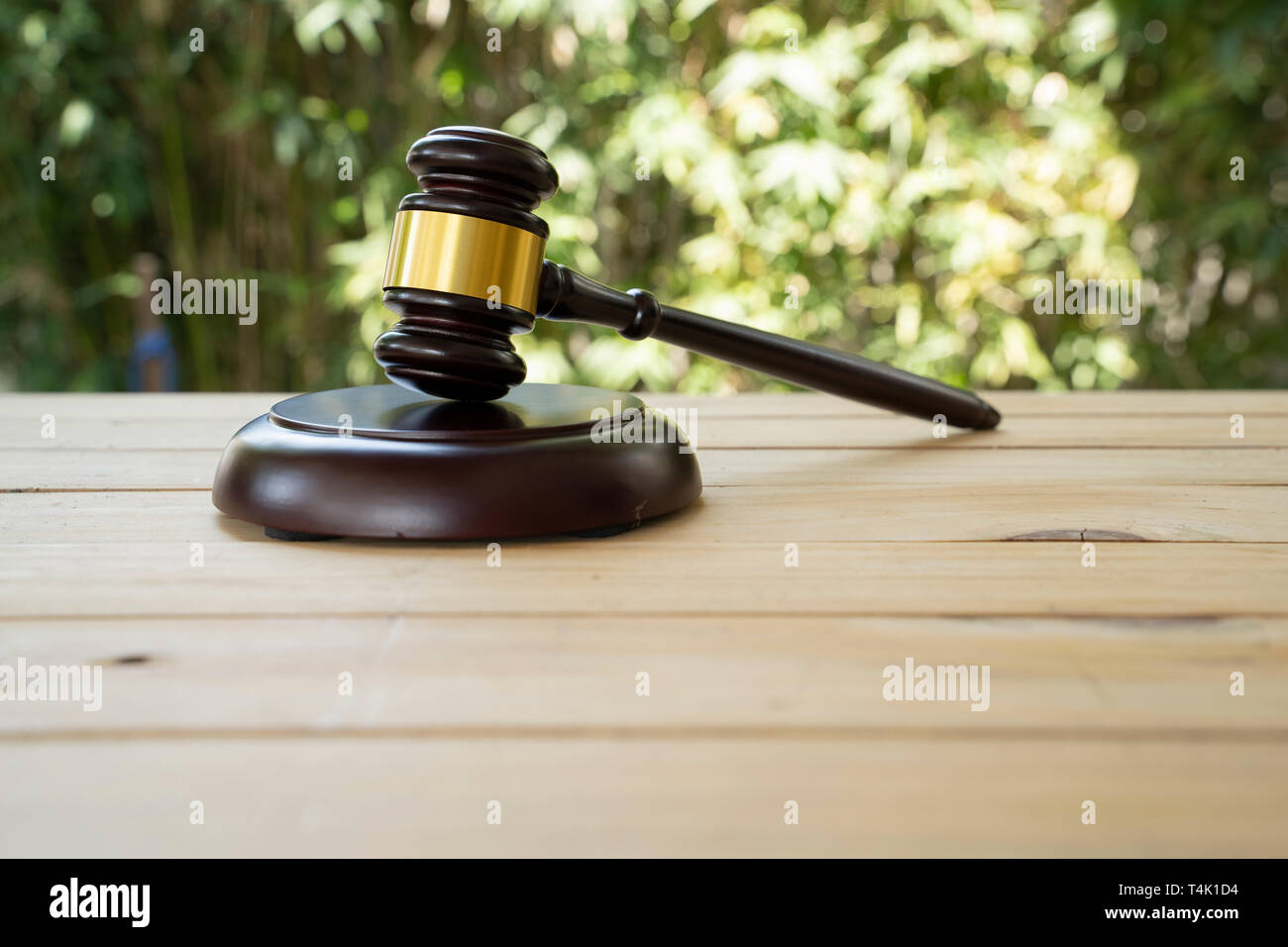 Hammer on the wooden table - picture Stock Photo - Alamy