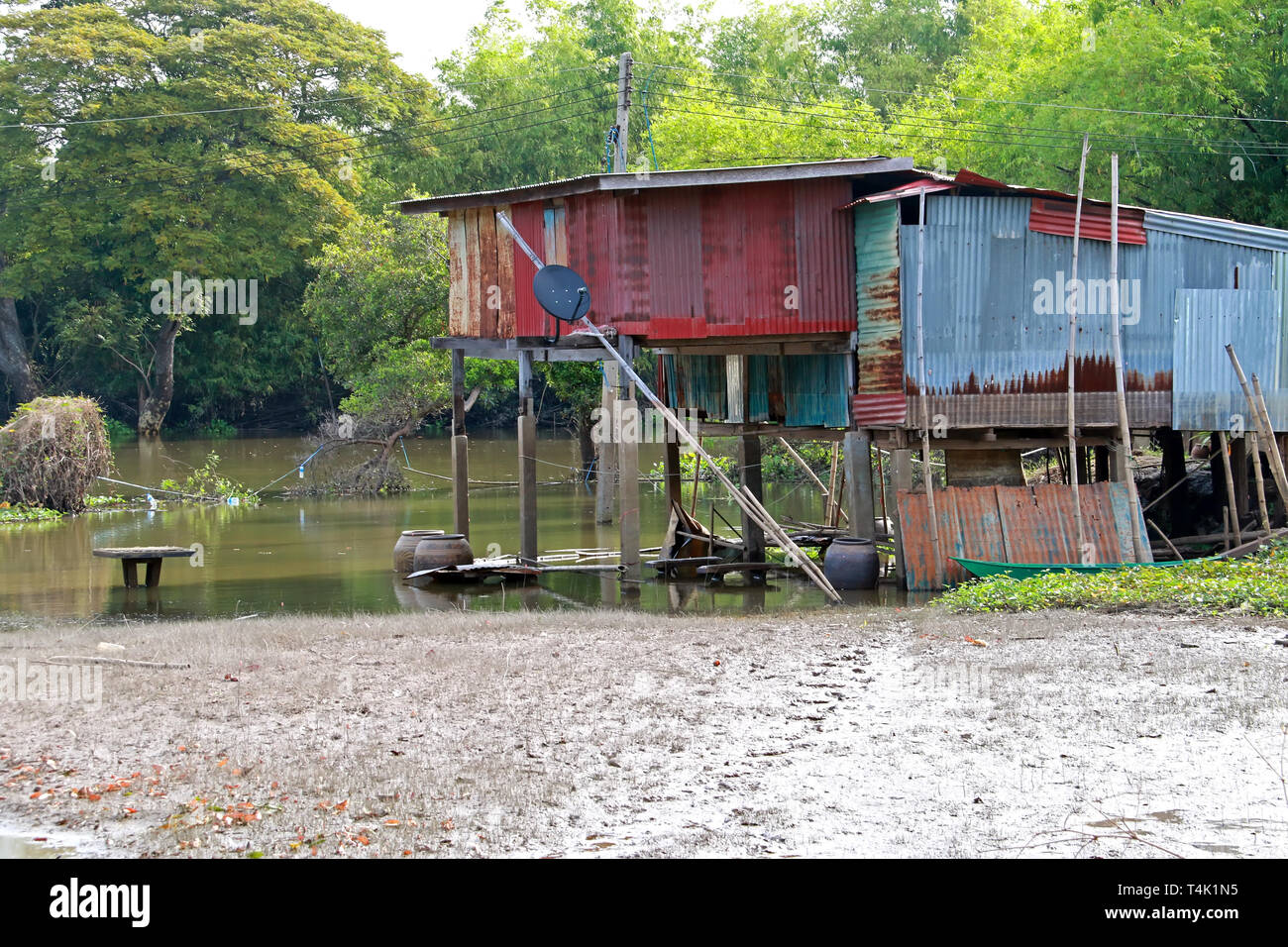wooden house flooded, old rural house in water Stock Photo - Alamy