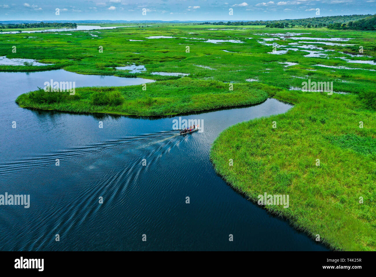 Up the river in small boat Stock Photo - Alamy