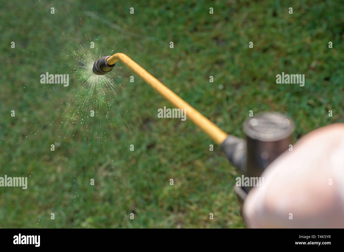 Hand insecticide spray hi-res stock photography and images - Alamy