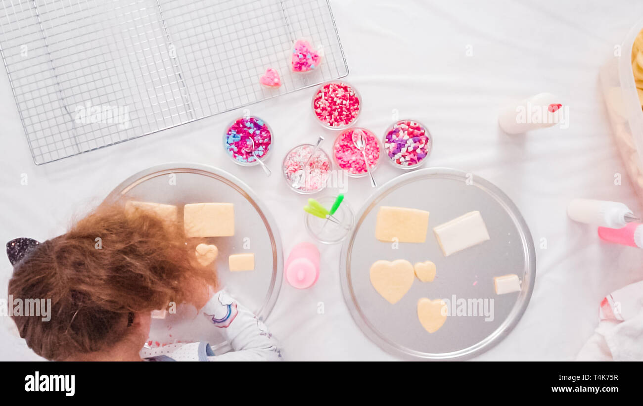 Flat lay. Step by step. Decorating sugar cookies with royal icing and ...