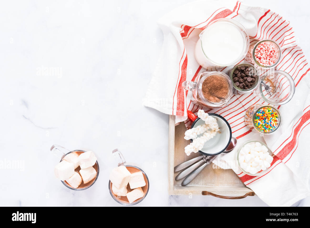 Flat lay. Hot chocolate bar with variety of topping on the tray Stock ...