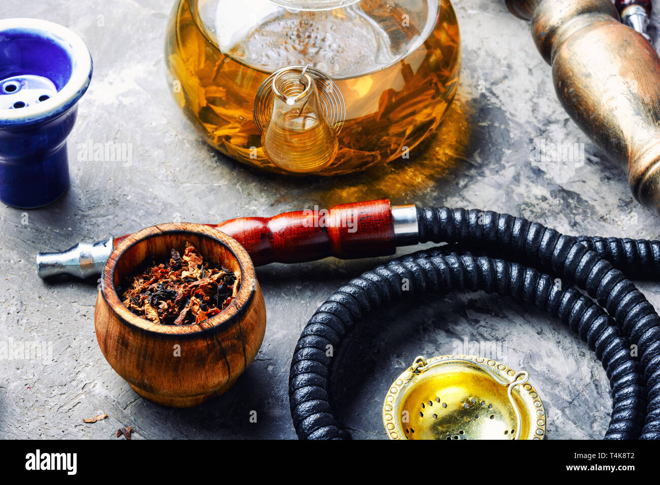 East smoking hookah. Arabian shisha with tea. Hookah and tea.Shisha ...