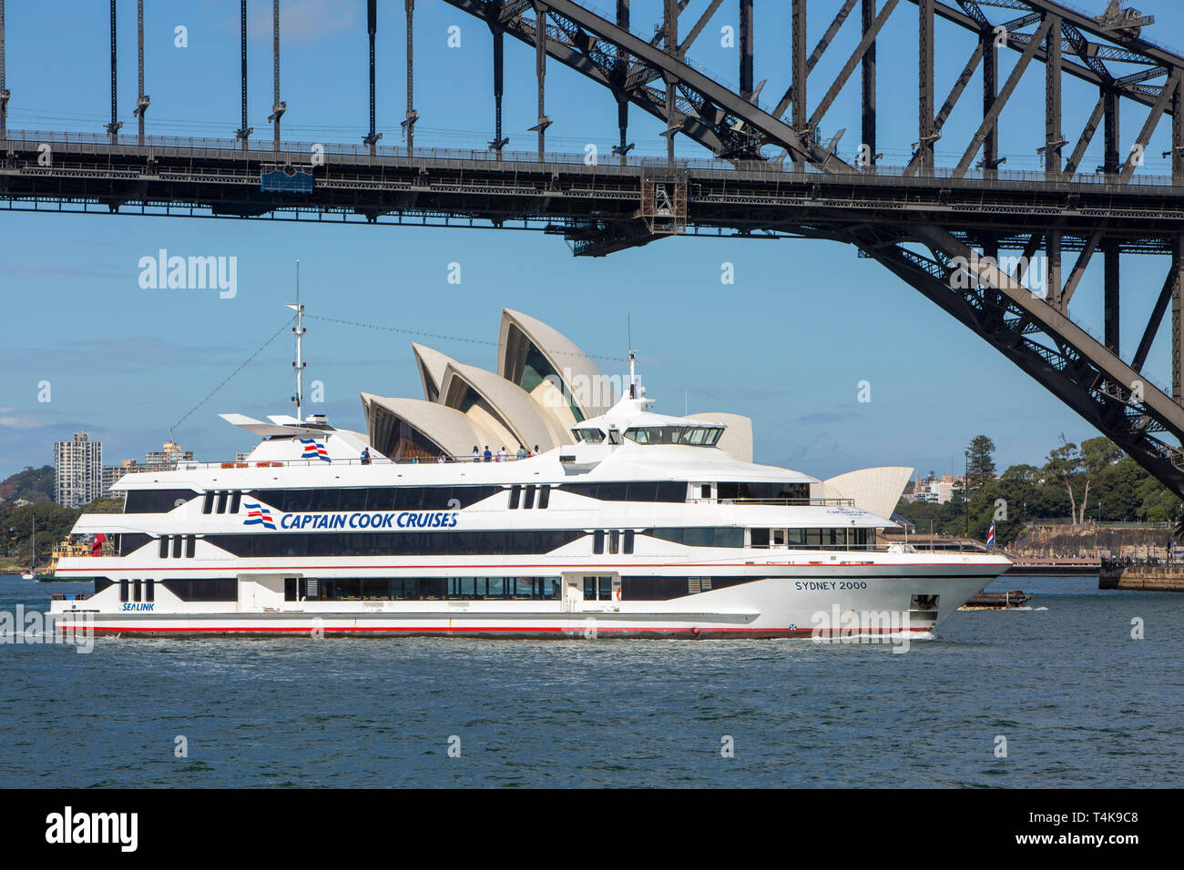 Captain Cook cruises boat vessel on Sydney harbour passing by the ...
