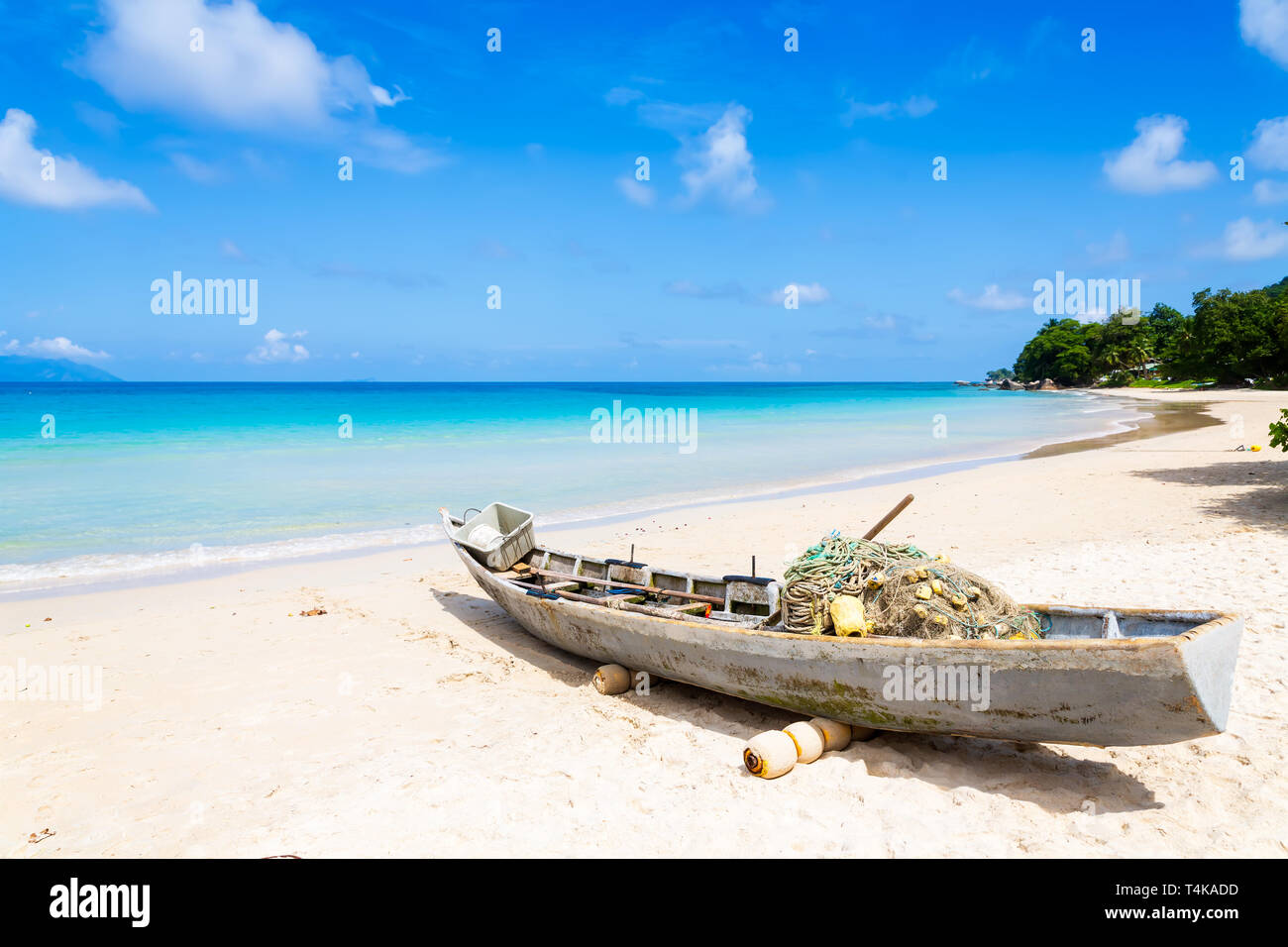 Boat on the beach at sunny summer day, Mahe, Seychelles Stock Photo - Alamy